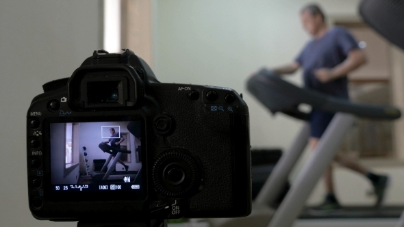 Camera Making Shots Of Man Running On Treadmill, Stock Footage | VideoHive