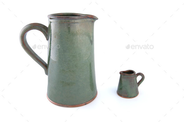 Large and small pitchers. Stock Photo by Olesya22 | PhotoDune