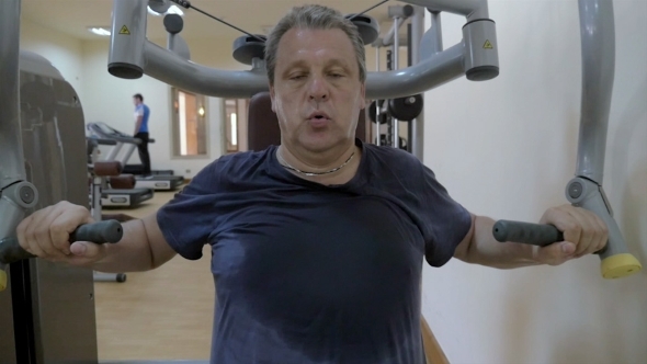 Sweaty Man Working Out On Exercise Machine, Stock Footage | VideoHive