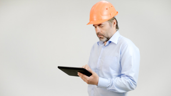 Engineer Typing Email on Tablet, Stock Footage | VideoHive