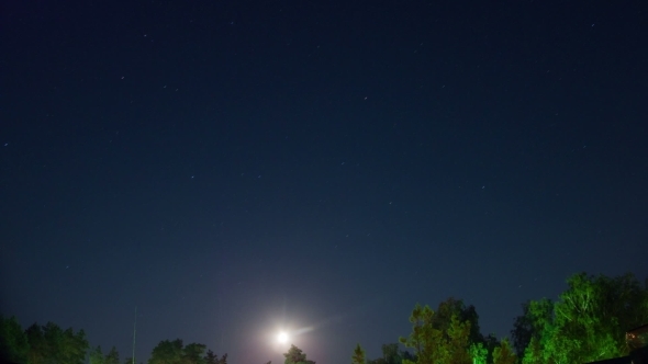 The Moon Rises Over The Horizon In The Background, Stock Footage ...