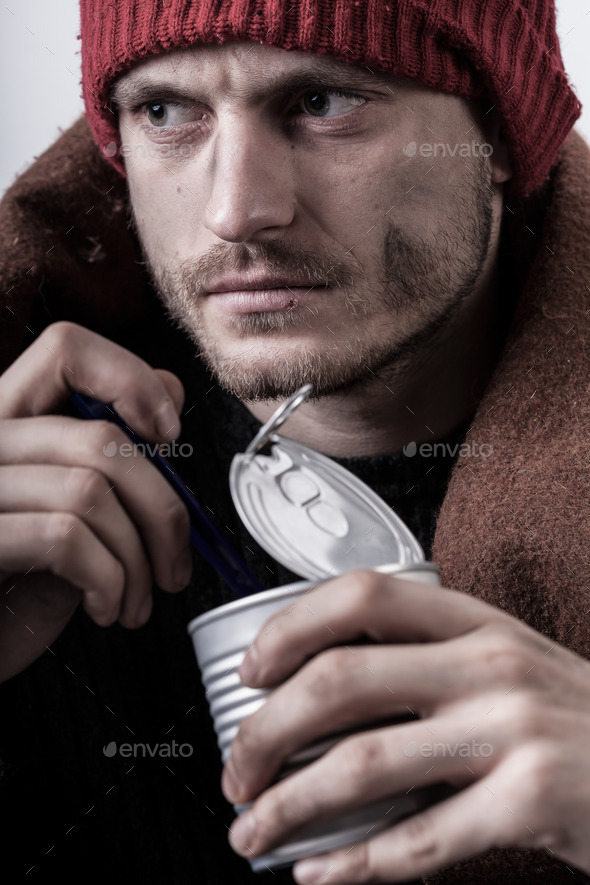 Poor man eating preserve Stock Photo by bialasiewicz | PhotoDune