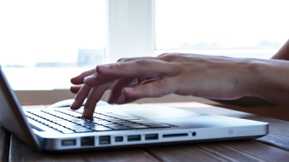 Working On Laptop On Wooden Desk, Stock Footage | VideoHive