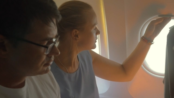 People Looking Out The Plane Window, Stock Footage | VideoHive