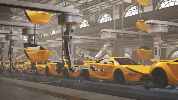 Modern, automated supercar assembly line. Robotic arms manufacturing ...