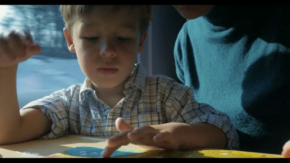 Child And Mother Reading Childrens Book In Train, Stock Footage | VideoHive