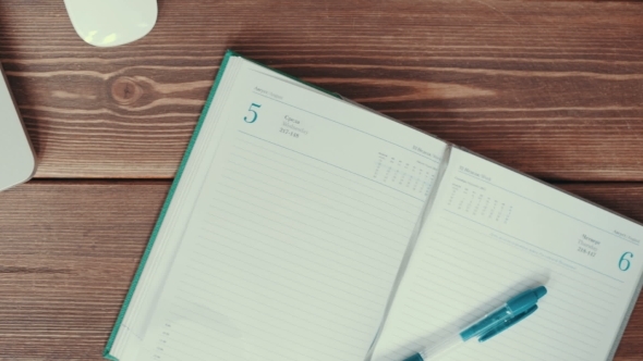 Laptop And Diary On The Desk, Stock Footage | VideoHive