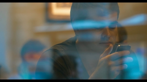 Young Man Behind The Glass Texting On Smartphone, Stock Footage | VideoHive