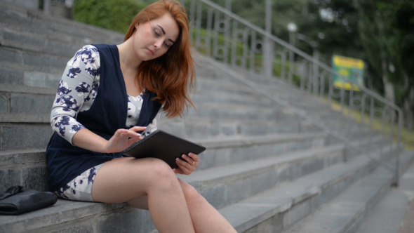 Girl Busy Online on Tablet, Stock Footage | VideoHive
