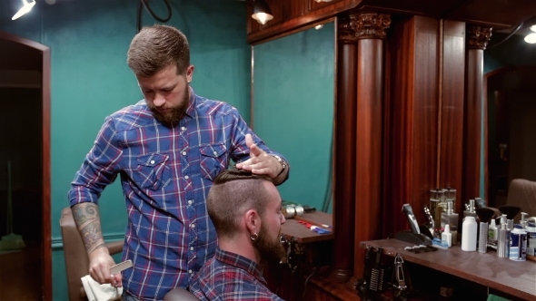 Beard Barber Making Haircut To Hipster Client, Stock Footage | VideoHive