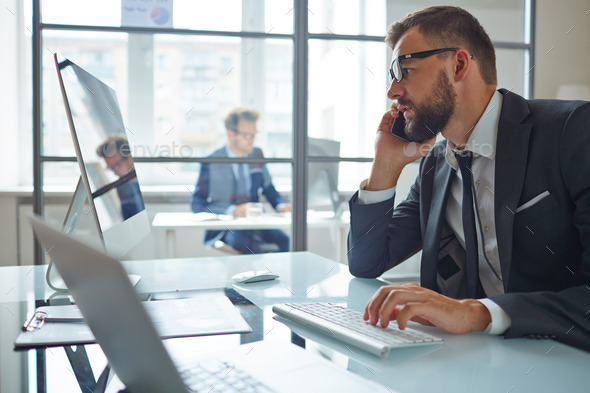 Communication in office Stock Photo by Pressmaster | PhotoDune