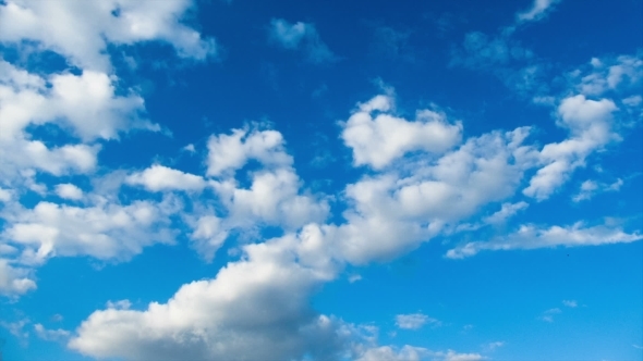 Clouds Moving In The Blue Sky., Stock Footage | VideoHive