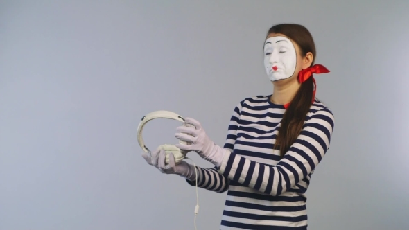 Woman Mime Listening To Music On Headphones, Stock Footage | VideoHive