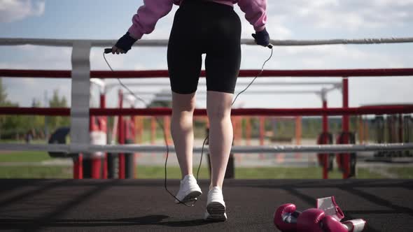 Back View Unrecognizable Female Boxer Jumping Rope in Slow Motion ...