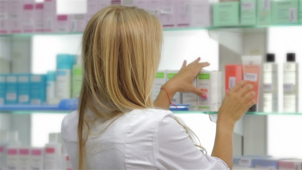 Pharmacist Fronting The Product In Drugstore, Stock Footage | VideoHive