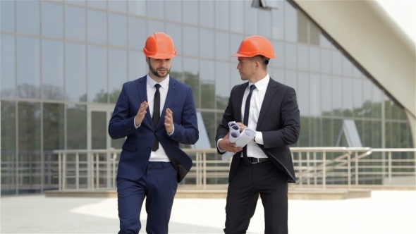 Two Architect Having a Conversation Outdoors, Stock Footage | VideoHive