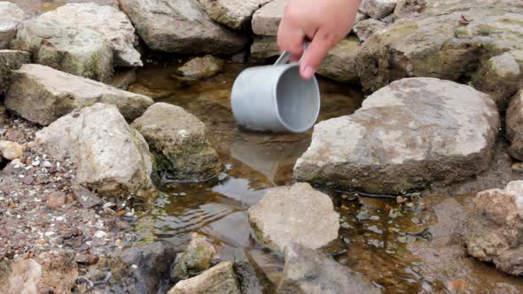 Drinking Near Spring Flowing Water, Stock Footage | VideoHive