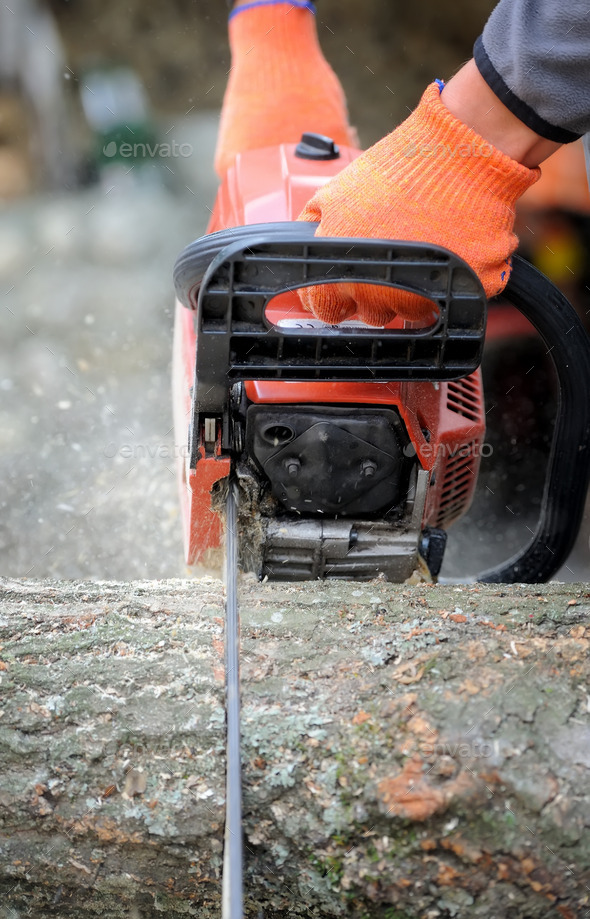 Chainsaw Stock Photo by byrdyak | PhotoDune