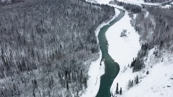 Drone flies over frozen alaska river., Stock Footage | VideoHive