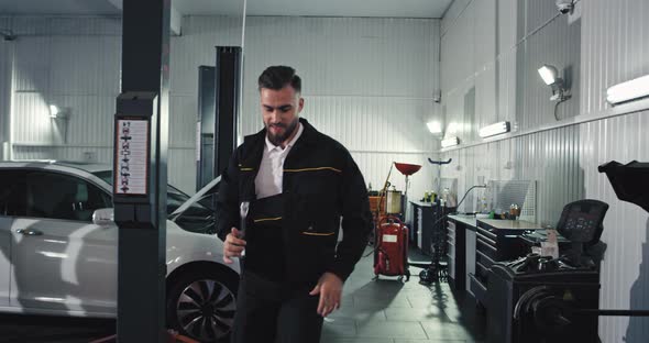 Dancing Mechanic Guy in a Uniform, Stock Footage | VideoHive