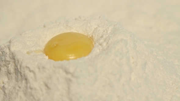 Egg Dropping Into Flour, Stock Footage | VideoHive