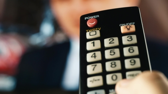 The Remote Control Switches Channels On The TV, Stock Footage | VideoHive