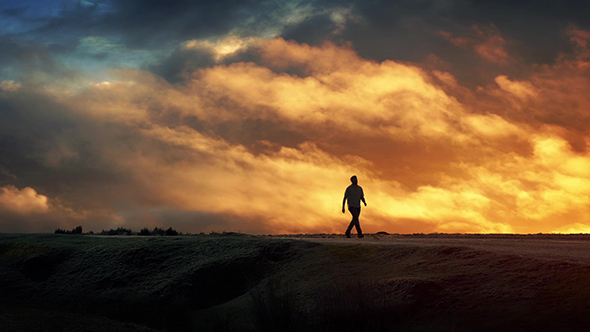 Man Walks On Horizon With Epic Cloudscape, Stock Footage | VideoHive
