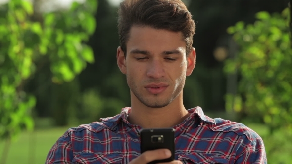 A Man Uses His Smart Phone, Stock Footage | VideoHive