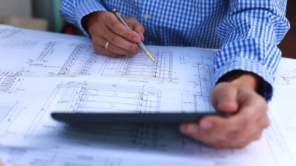 Engineer Does the Calculations Using the Tablet, Stock Footage | VideoHive