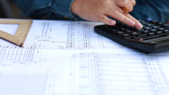Architect Makes Calculations Using the Calculator, Stock Footage ...