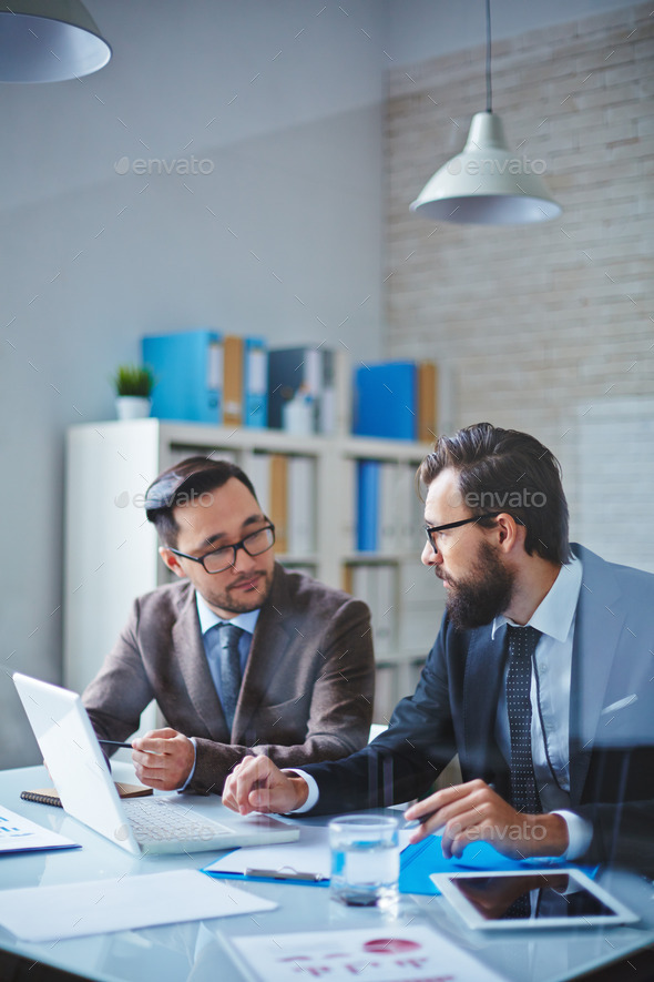 Businessmen at work Stock Photo by Pressmaster | PhotoDune
