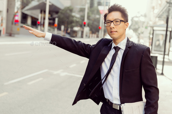 Waving for a taxi in city Stock Photo by nexusplexus | PhotoDune