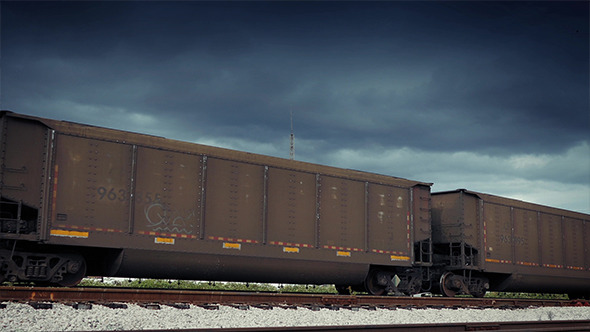 Freight Train Carriages Passing Dramatic Sky, Stock Footage | VideoHive