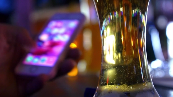 Using Mobile Phone With Beer Glass At Bar Counter, Stock Footage ...