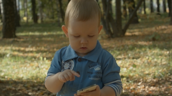 Adorable Baby Dialing Number On Mobile Phone., Stock Footage | VideoHive