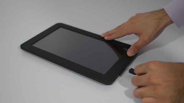 Unplugging Tablet with USB Cable, Stock Footage | VideoHive