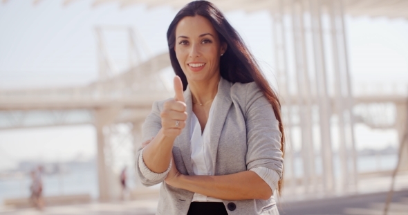 Motivated Young Woman Giving a Thumbs Up, Stock Footage | VideoHive