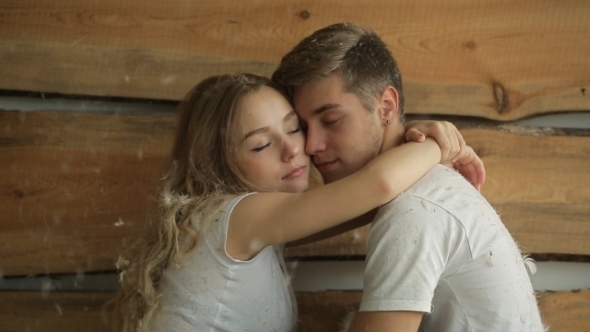 Couple On The Background Of Wooden Wall Hugging, Stock Footage | VideoHive
