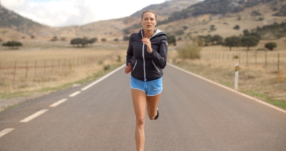 Fitness Girl Running On The Road In Mountains, Stock Footage | VideoHive