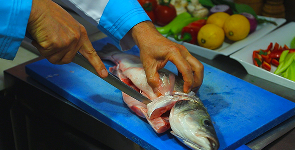 Chef Cutting Fish In Restaurant, Stock Footage | VideoHive