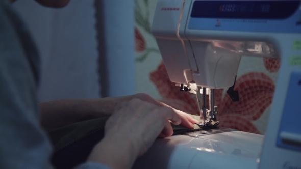Woman Sews On The Sewing Machine, Stock Footage | VideoHive