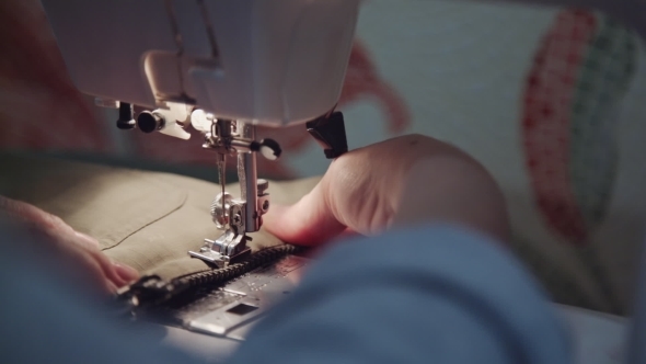 Woman Sews On The Sewing Machine, Stock Footage | VideoHive