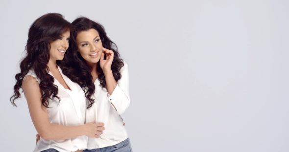 Two Beautiful Woman Friends Posing Arm In Arm, Stock Footage | VideoHive