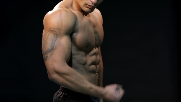 Black Athletic Man Shows Biceps, Stock Footage | VideoHive