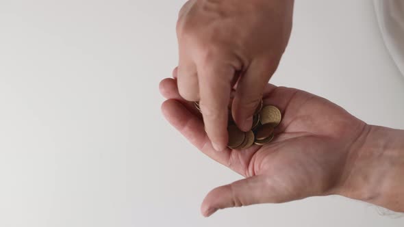 A Poor Man Counting Coins in the Palm of His Hand, Stock Footage ...