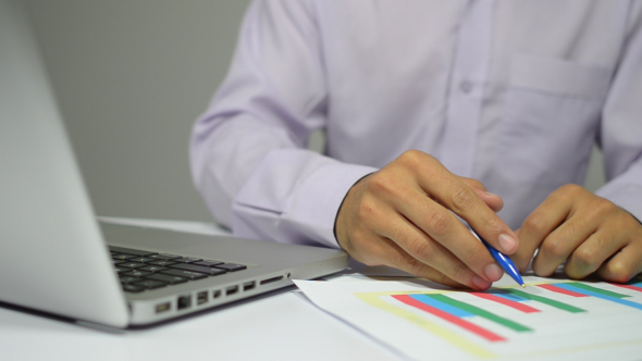 Businessman Working on Finance of Company, Stock Footage | VideoHive