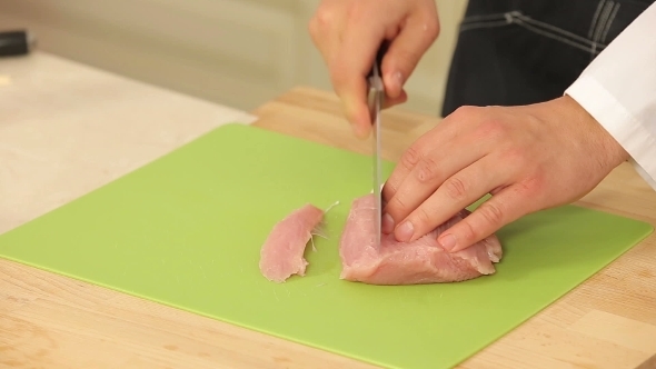 Chef Is Cutting Turkey Fillets On a Cutting Board, Stock Footage ...