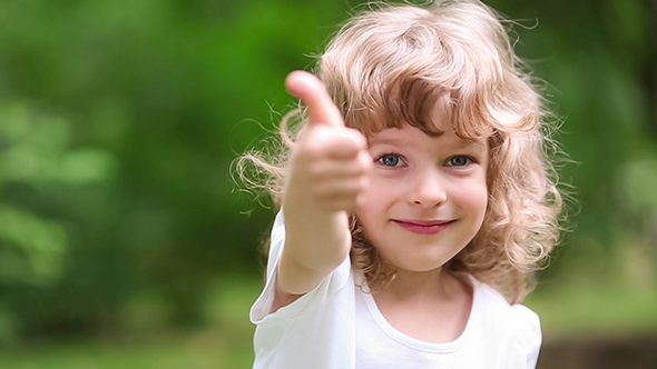 Happy Child Showing Thumbs Up, Stock Footage | VideoHive