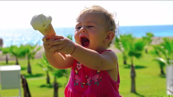 Baby Eats Ice Cream in the Summer, Stock Footage | VideoHive