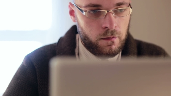 Man Working On Laptop Computer In The Workplace, Stock Footage | VideoHive